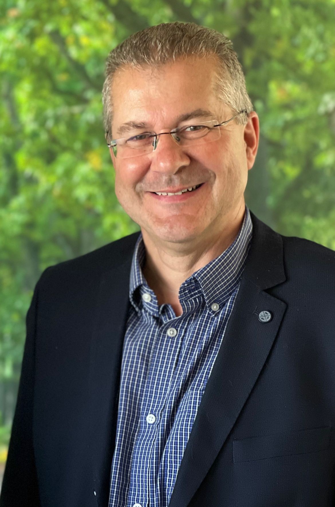 Herzlich Willkommen, Johann Candrian – Revion Treuhand AG